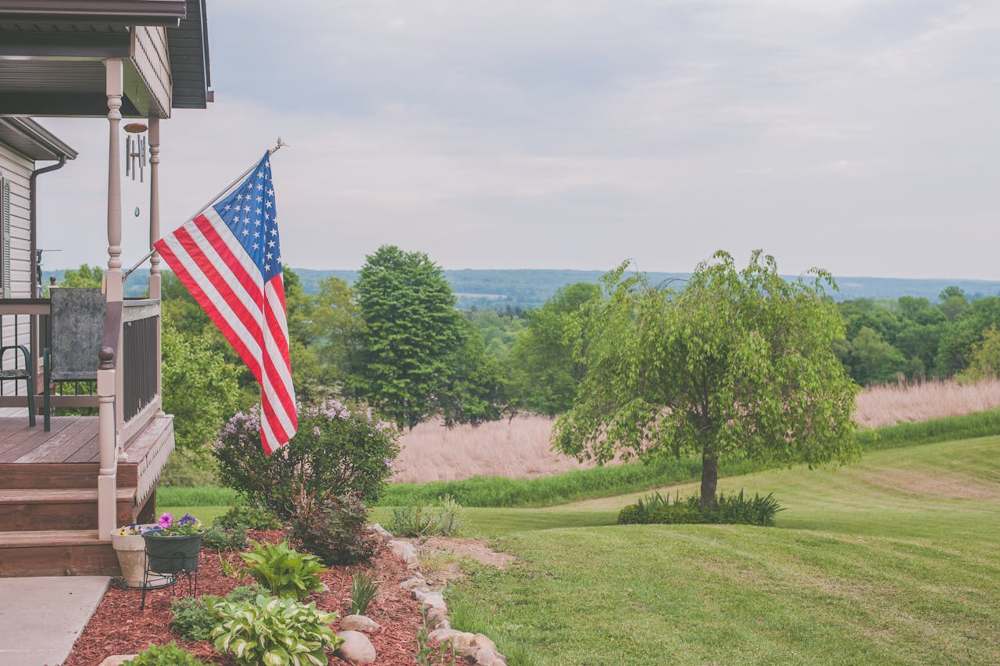 5 Patriotic Ideas for Decorating a House With an American Flag - Cargo ...