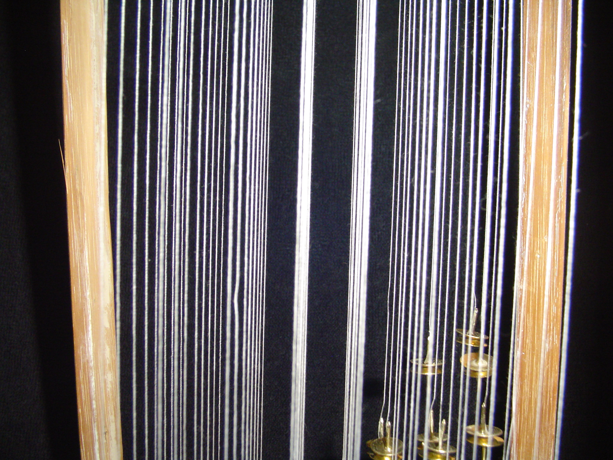 Kinetic sculpture of water ripple, using pins and thread - Bertie Pleass